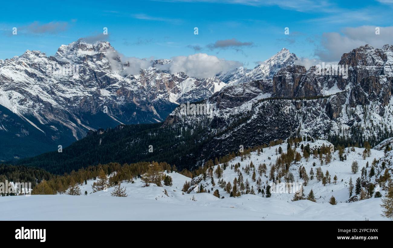 The snowy Dolomites stretch endlessly in a breathtaking panorama, where ...