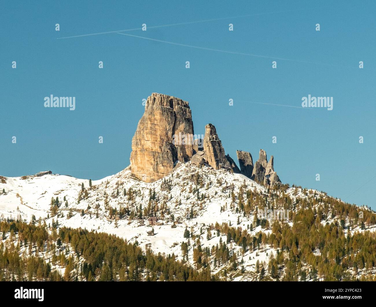 The colorful autumn forest along the Croda di Lago trail offers a ...