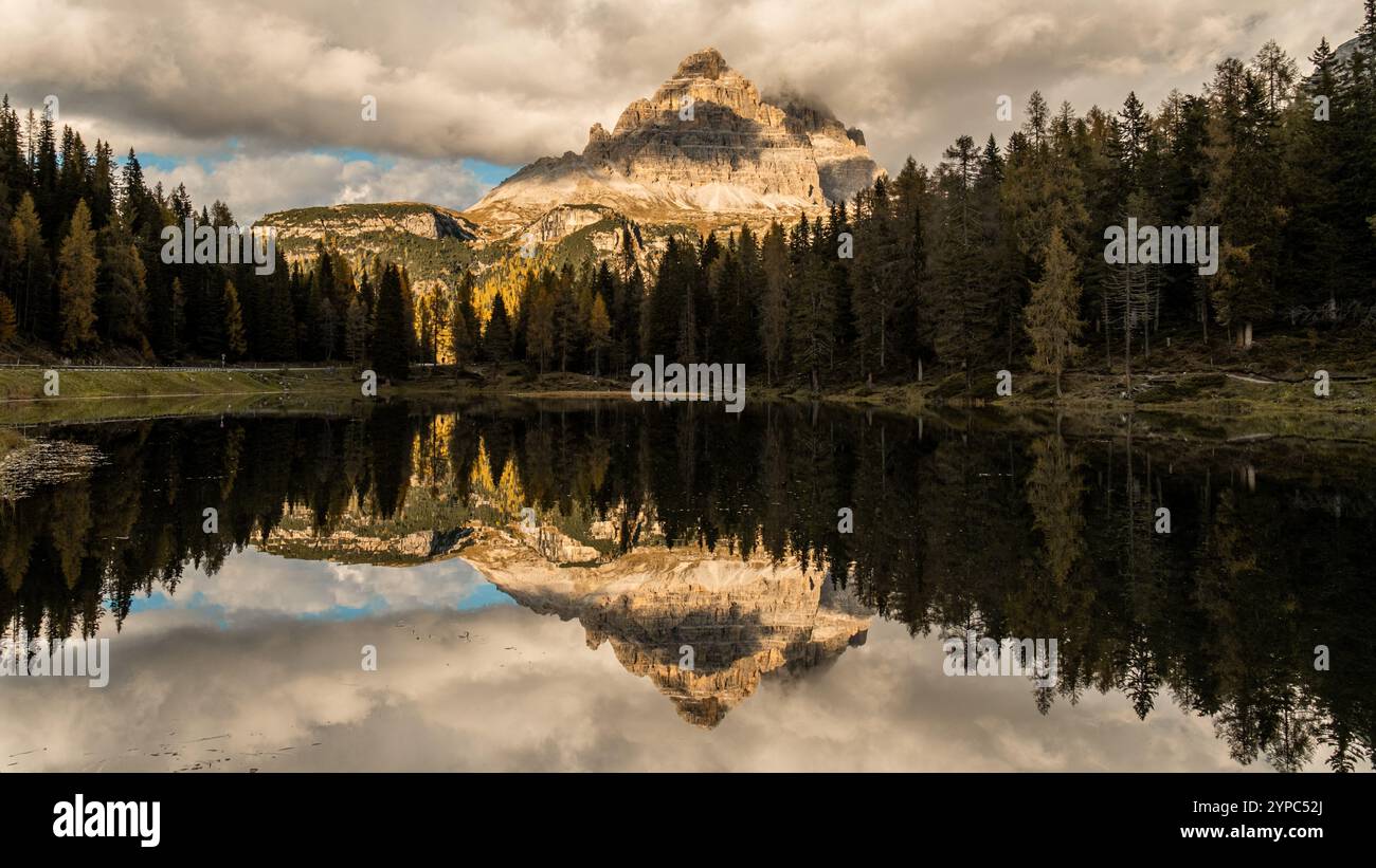 Crystal clear waters mirror the majestic peaks of the dolomites hi-res ...