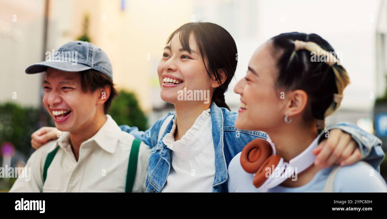Happy, asian students or hug with laugh in city for social, community ...