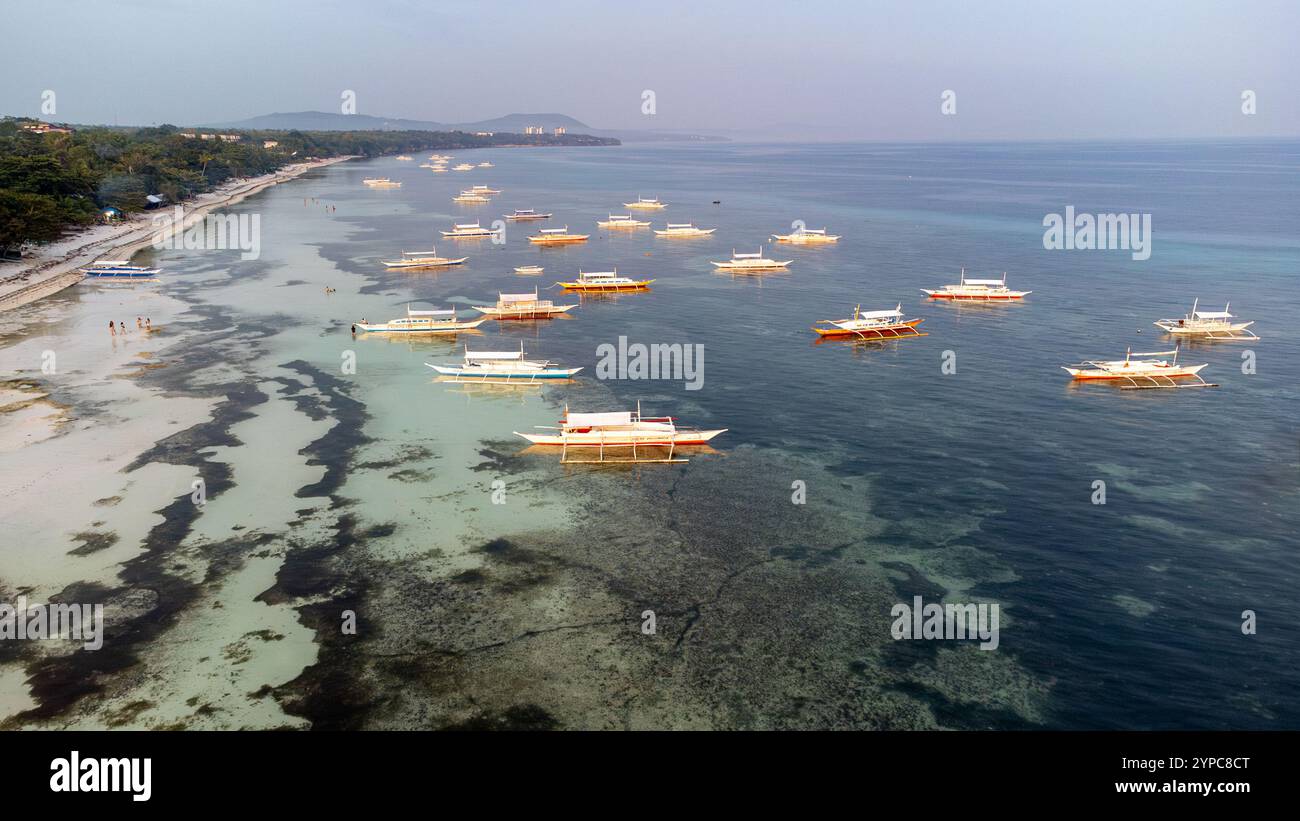 Aerial view of the beach with fishing boats in Bohol, Philippines Stock ...