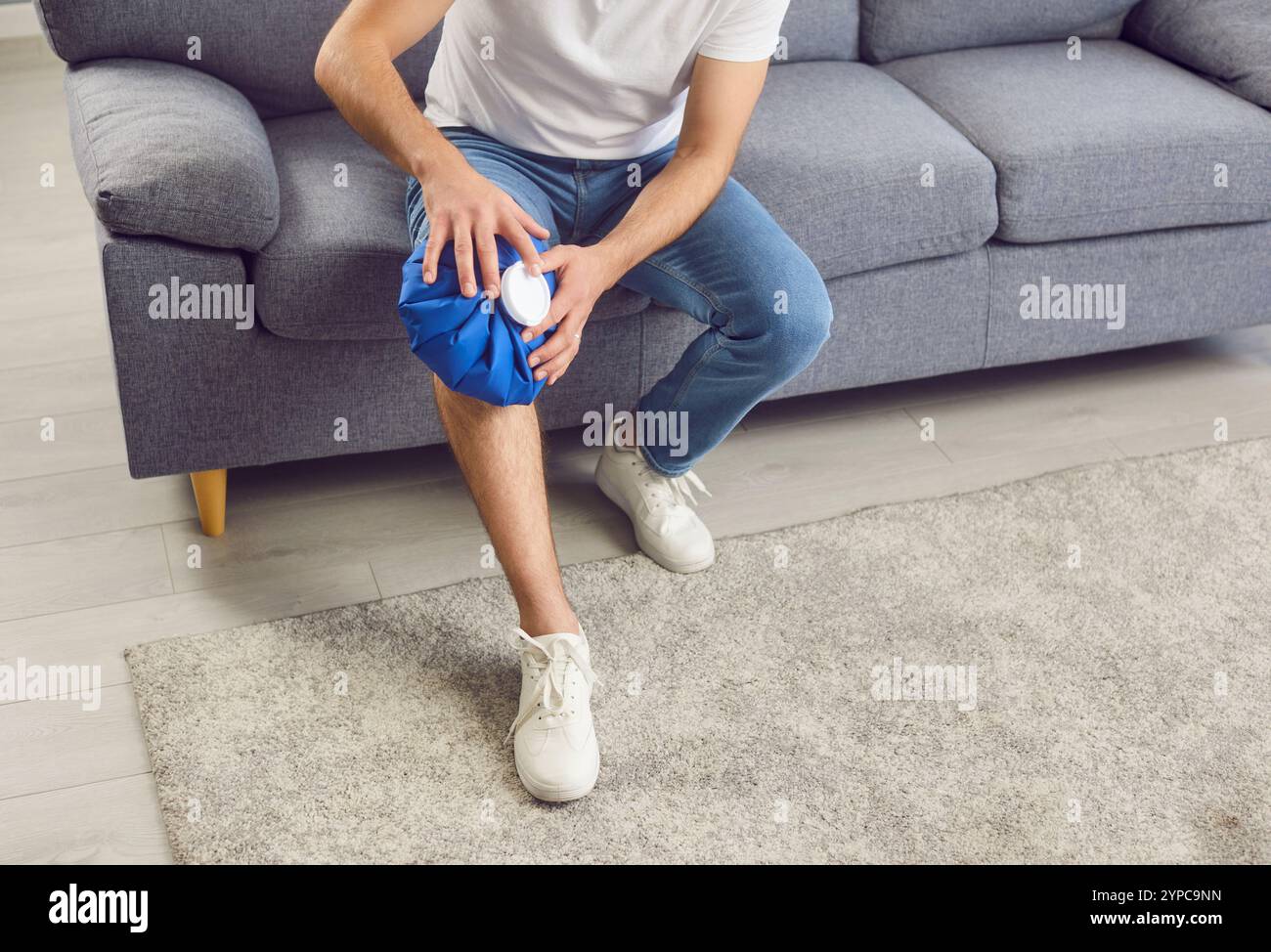 Sitting healthcare and medicine injured applying hi-res stock ...