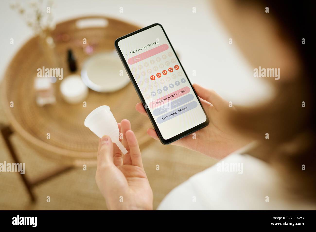 High angle shot of unrecognizable female hands holding white menstrual ...