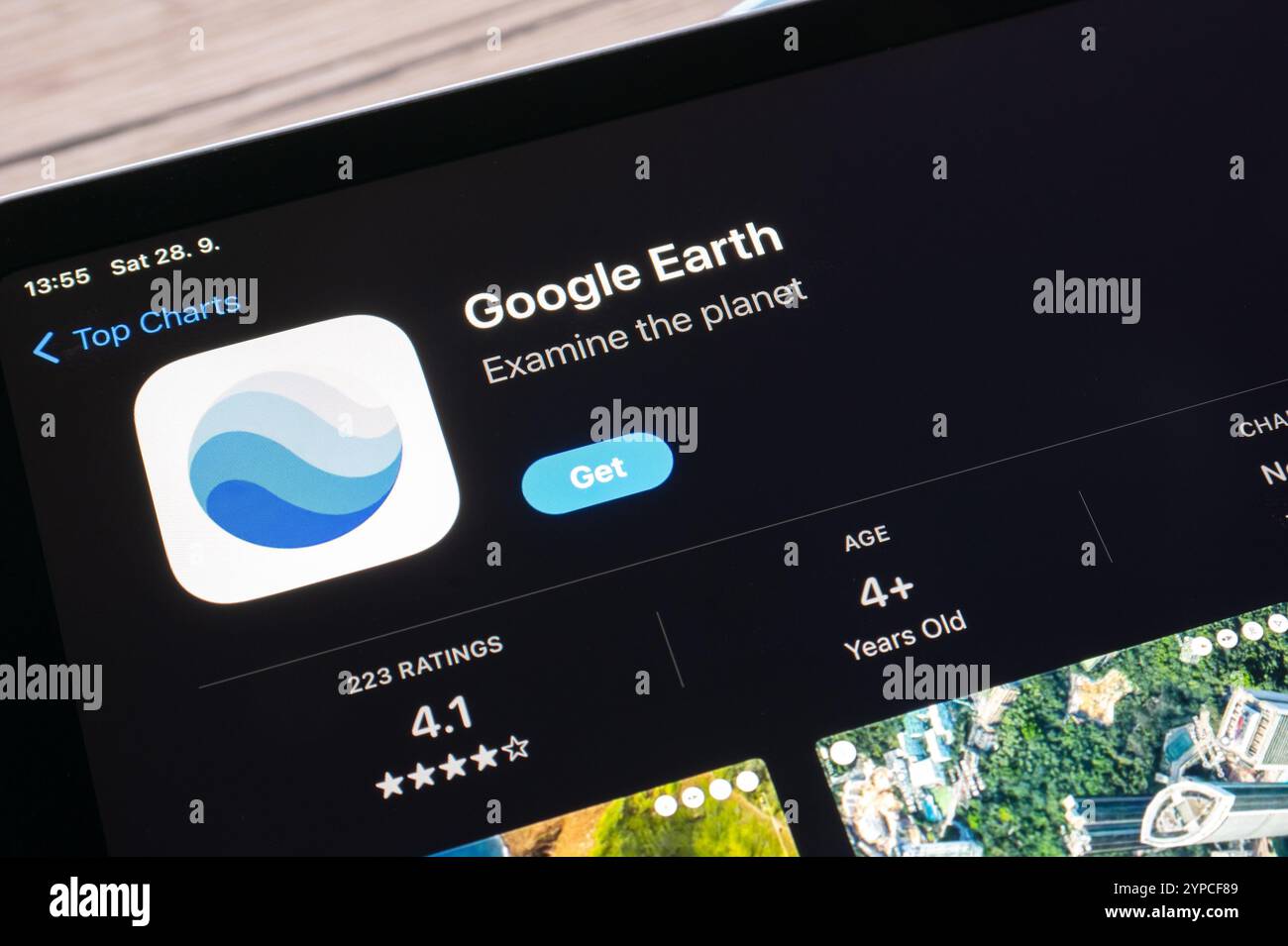 OSTRAVA, CZECHIA - SEPTEMBER 28, 2024: App store with Google Earth map ...
