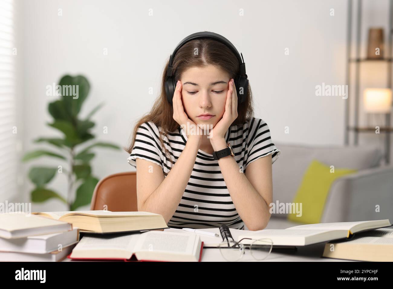 Preparing for exam. Tired student sleeping at table indoors Stock Photo ...