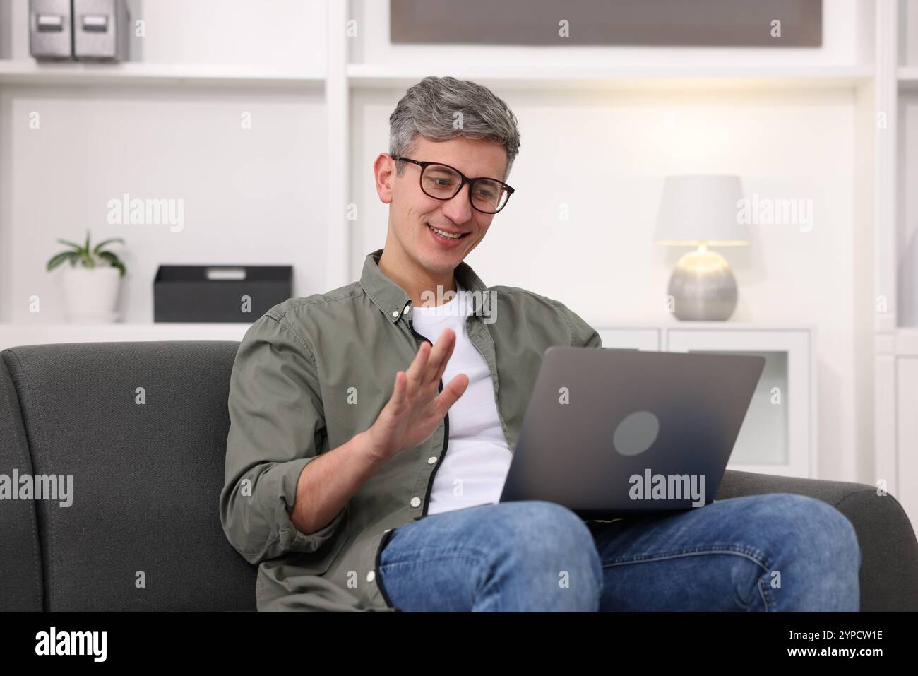 Professional psychologist working with laptop in office Stock Photo - Alamy