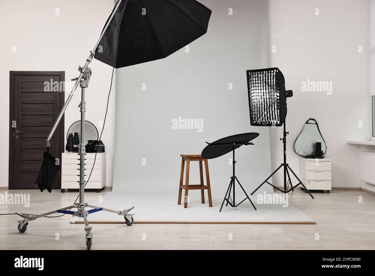 Professional lighting equipment setup in modern photo studio Stock ...