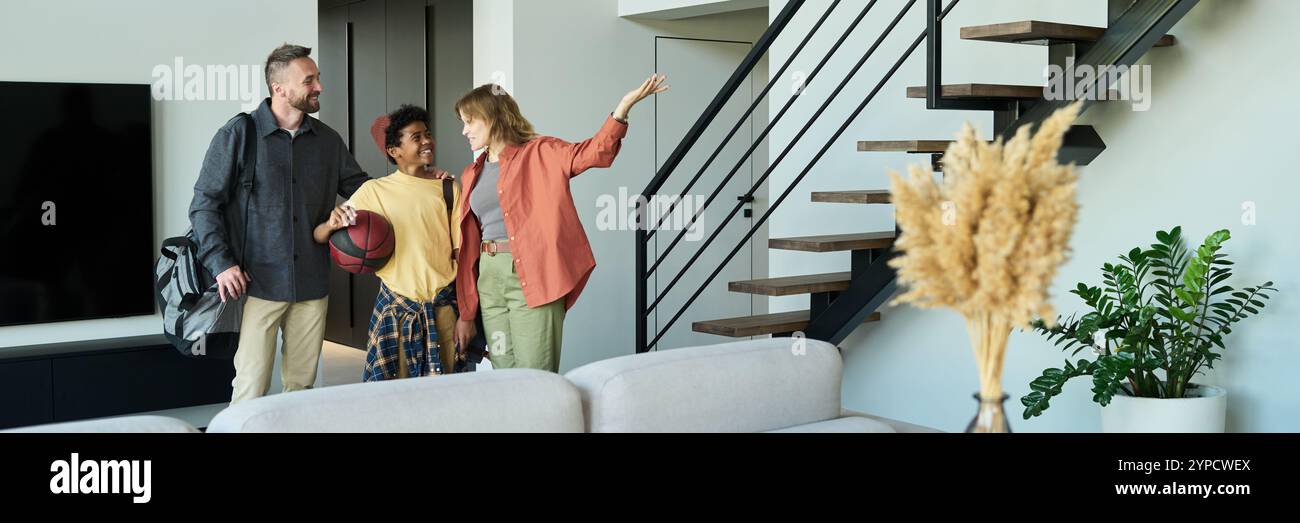 Multiracial family greeting visitor inside stylish modern living room ...