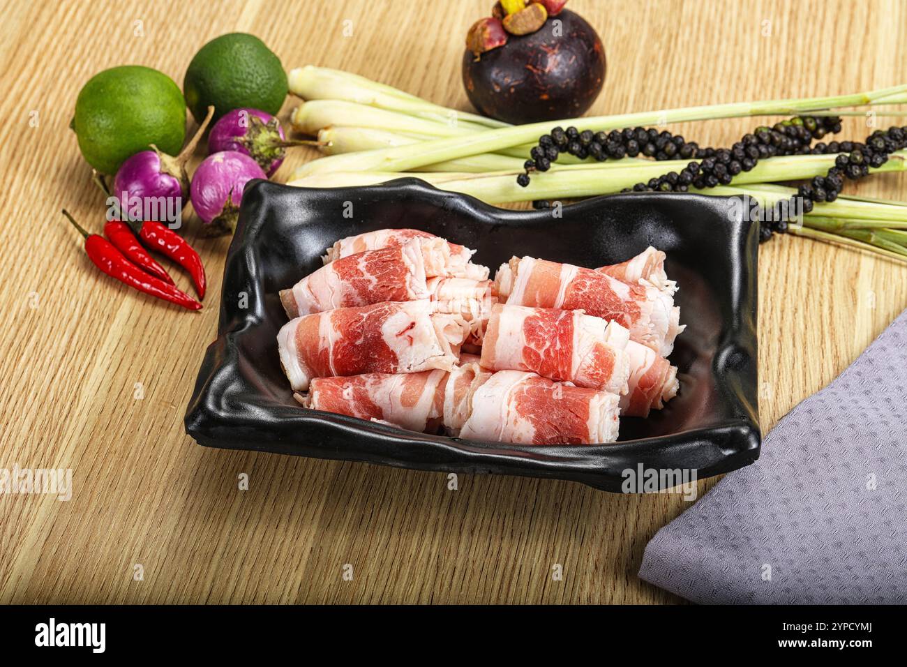 Raw beef bacon roll for grill Stock Photo - Alamy