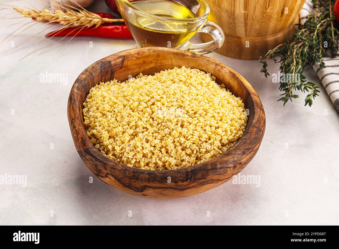 Italian cuisine - dry stelline pasta for bowl Stock Photo - Alamy