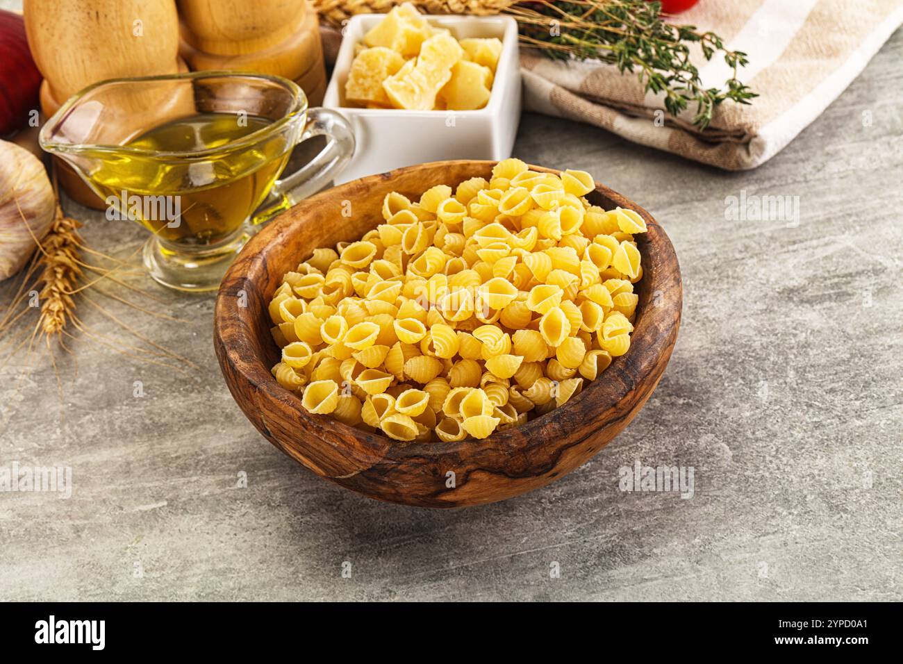 Italian cuisine - dry conchiglie shell pasta Stock Photo - Alamy