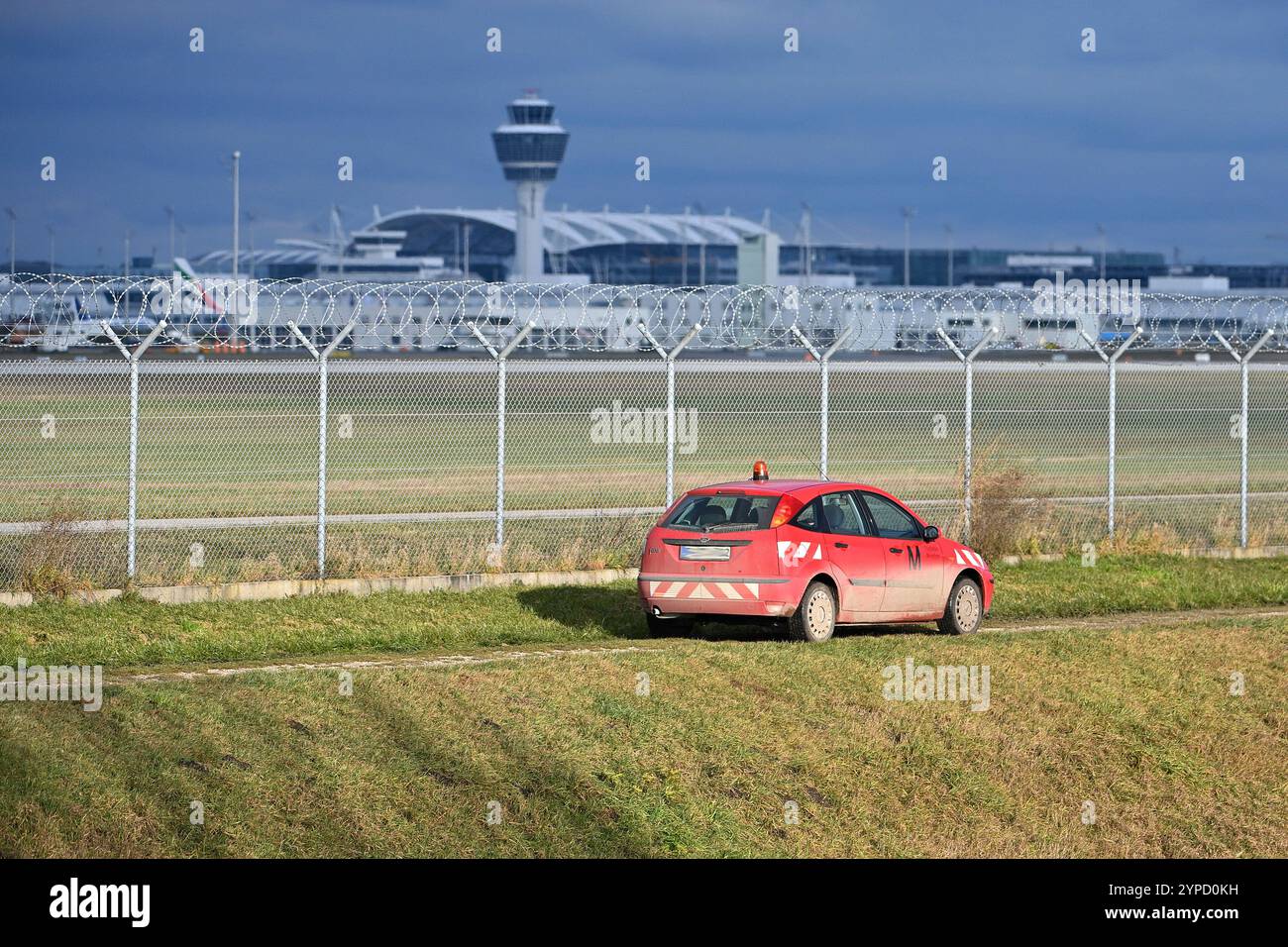 Emergency vehicle patrols and checks the fence, safety fence at Franz ...