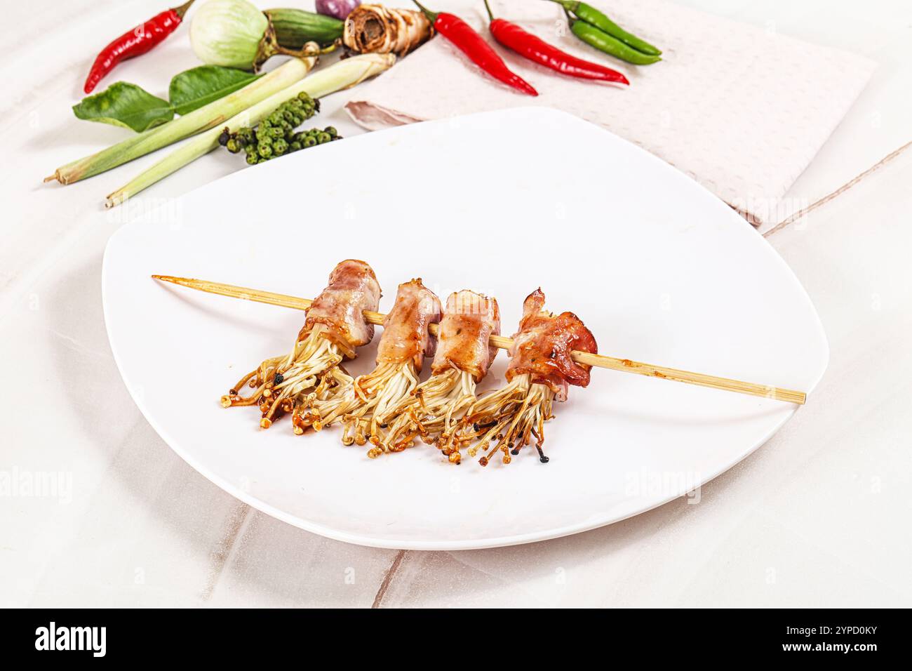 Thai Street foof satay with bacon and mushroom enoki skewer Stock Photo ...