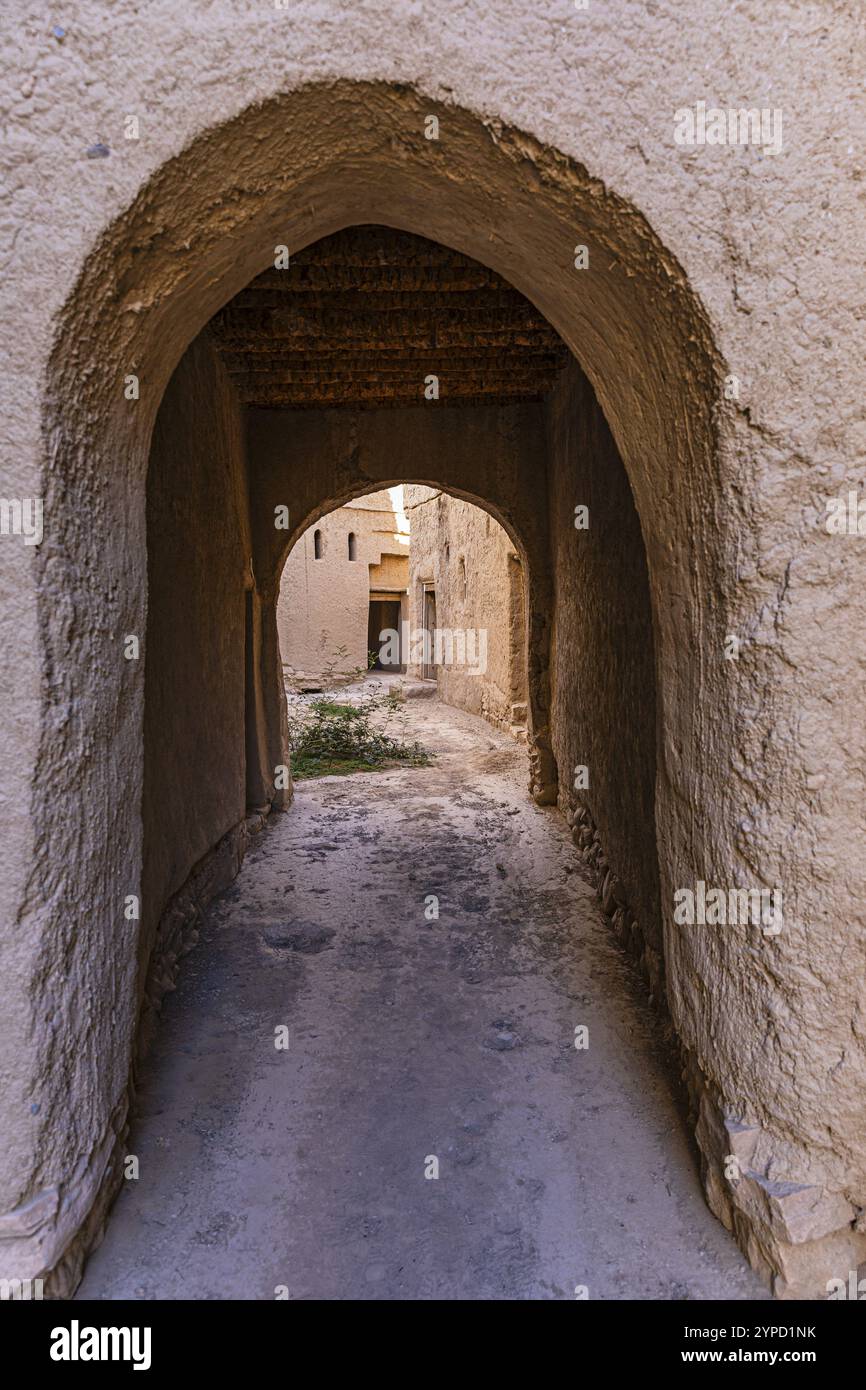 Narrow passageway in the largest preserved mud town in Oman, Al Bilaad ...