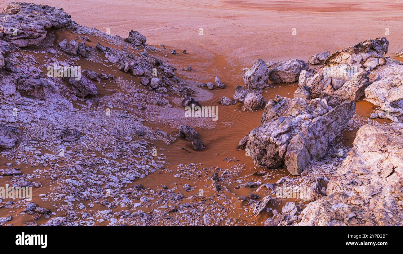 Striking cliffs surrounded by windswept sand structures, Huqf stone ...