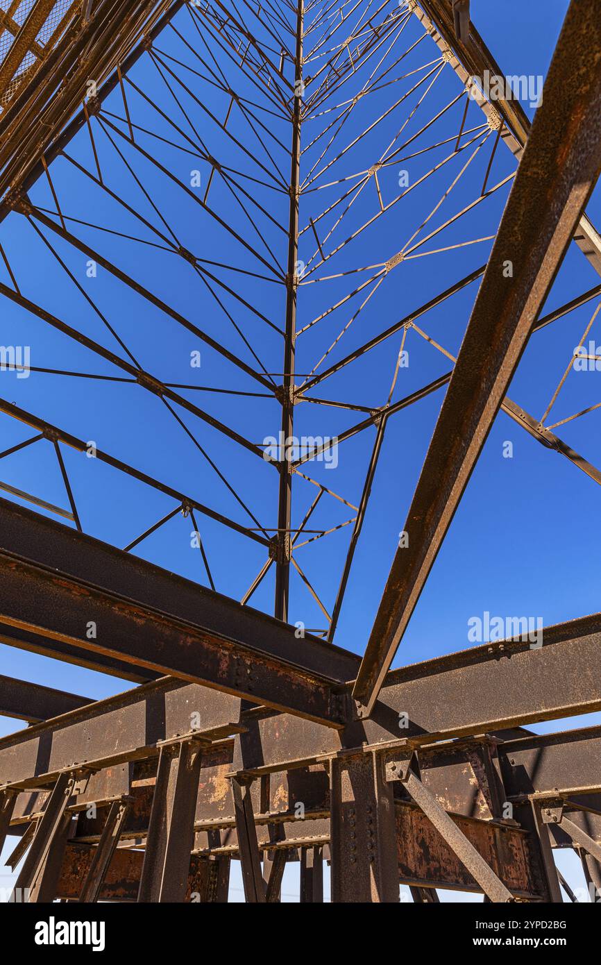 Rusted remains of a former oil derrick, Arabian Peninsula, Sultanate of ...