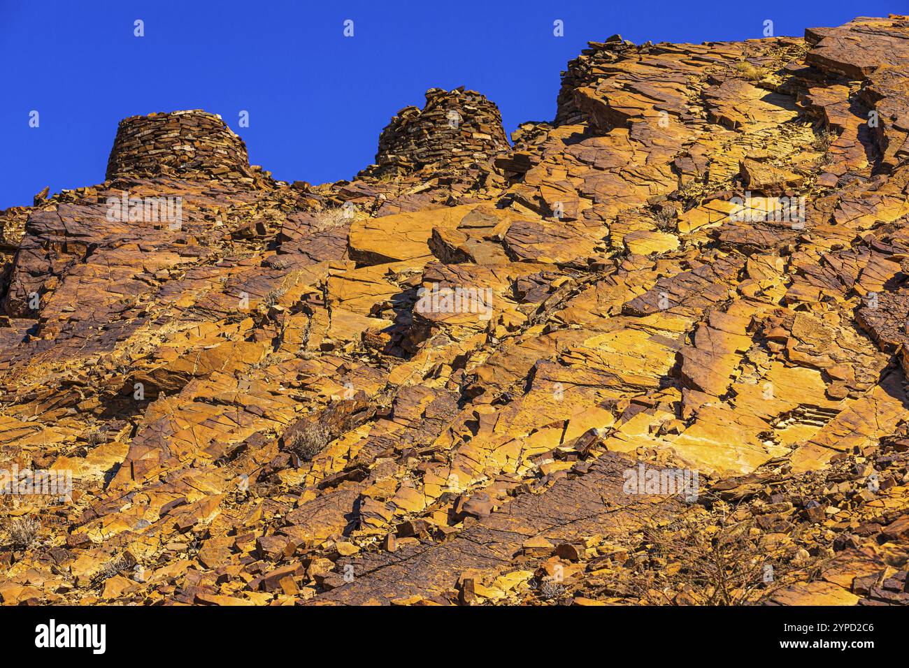 Round tombs made of unhewn stones, beehive tombs with split rock slabs ...
