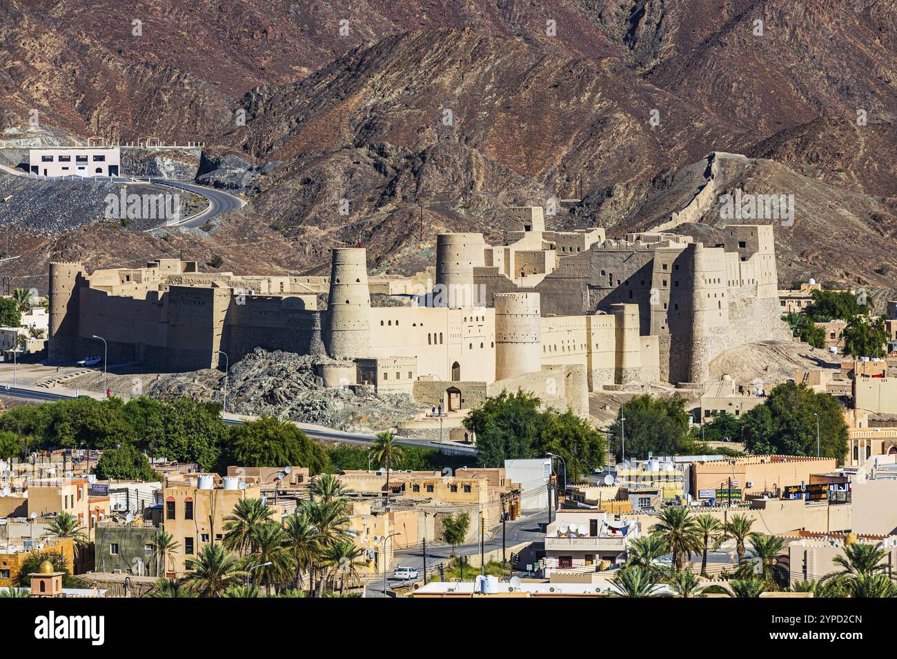 View of the town of Bahla, with the clay fortress of Hisn Tamah in the ...