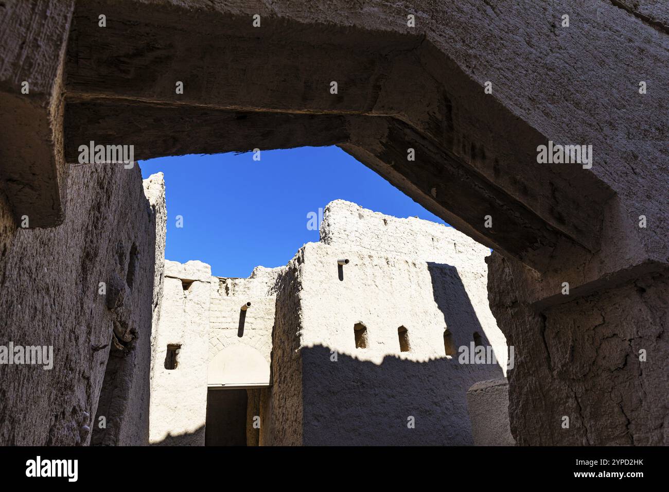 Remains of walls in the largest preserved mud town in Oman, Al Bilaad ...