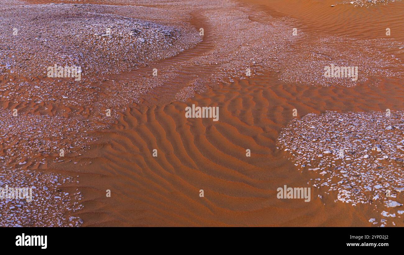 Gravel surrounded by wind-blown sand structures, Huqf stone desert ...
