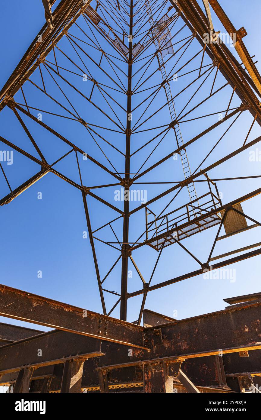 Rusted remains of a former oil derrick, Arabian Peninsula, Sultanate of ...