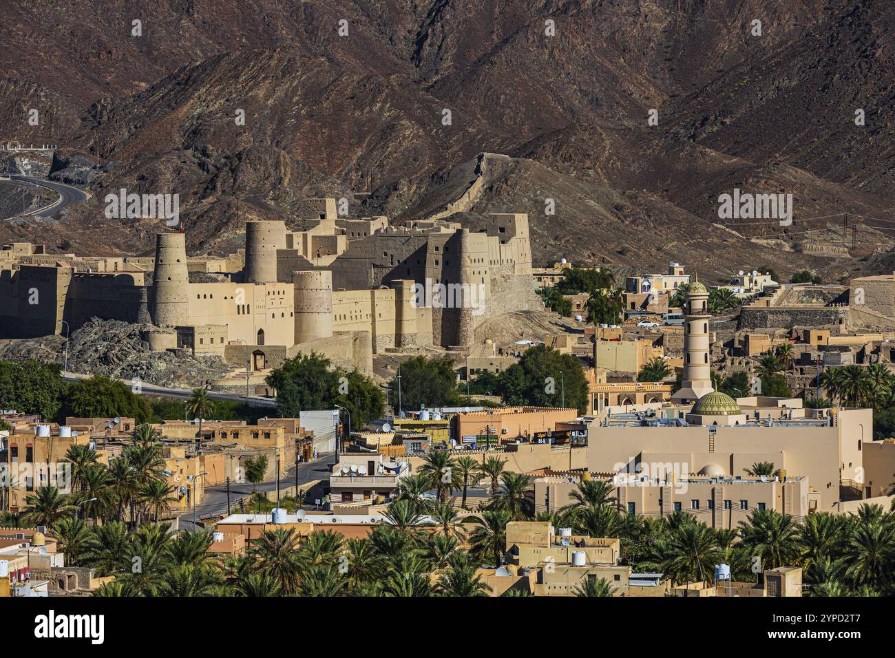 View of the town of Bahla, with the clay fortress of Hisn Tamah in the background, Bahla ...