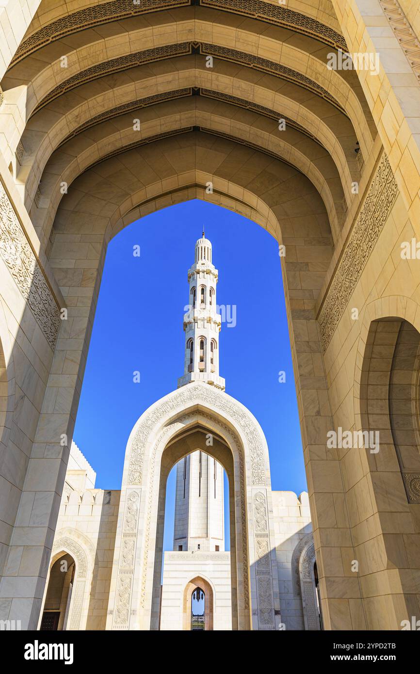 Arched gates and minaret of the Sultan Qaboos Mosque, Muscat, Arabian ...