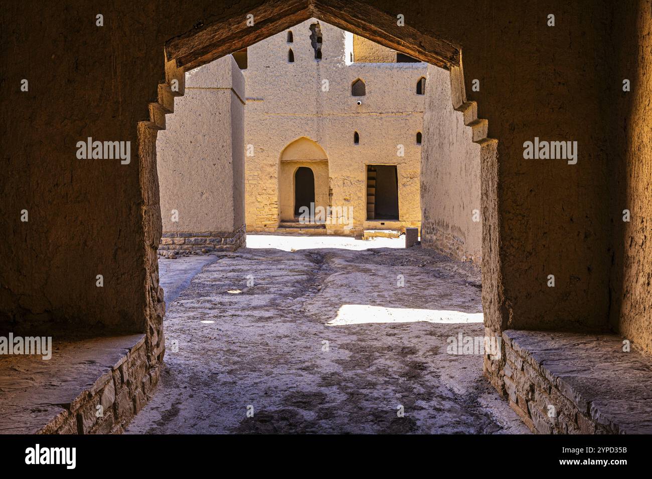Narrow passageway in the largest preserved mud town in Oman, Al Bilaad ...