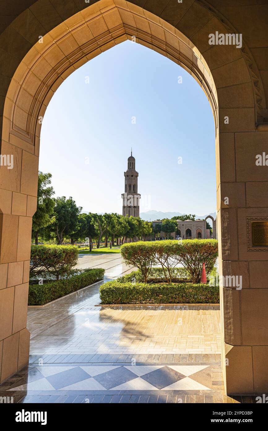 Arched gate and minaret of the Sultan Qaboos Mosque, Muscat, Arabian ...