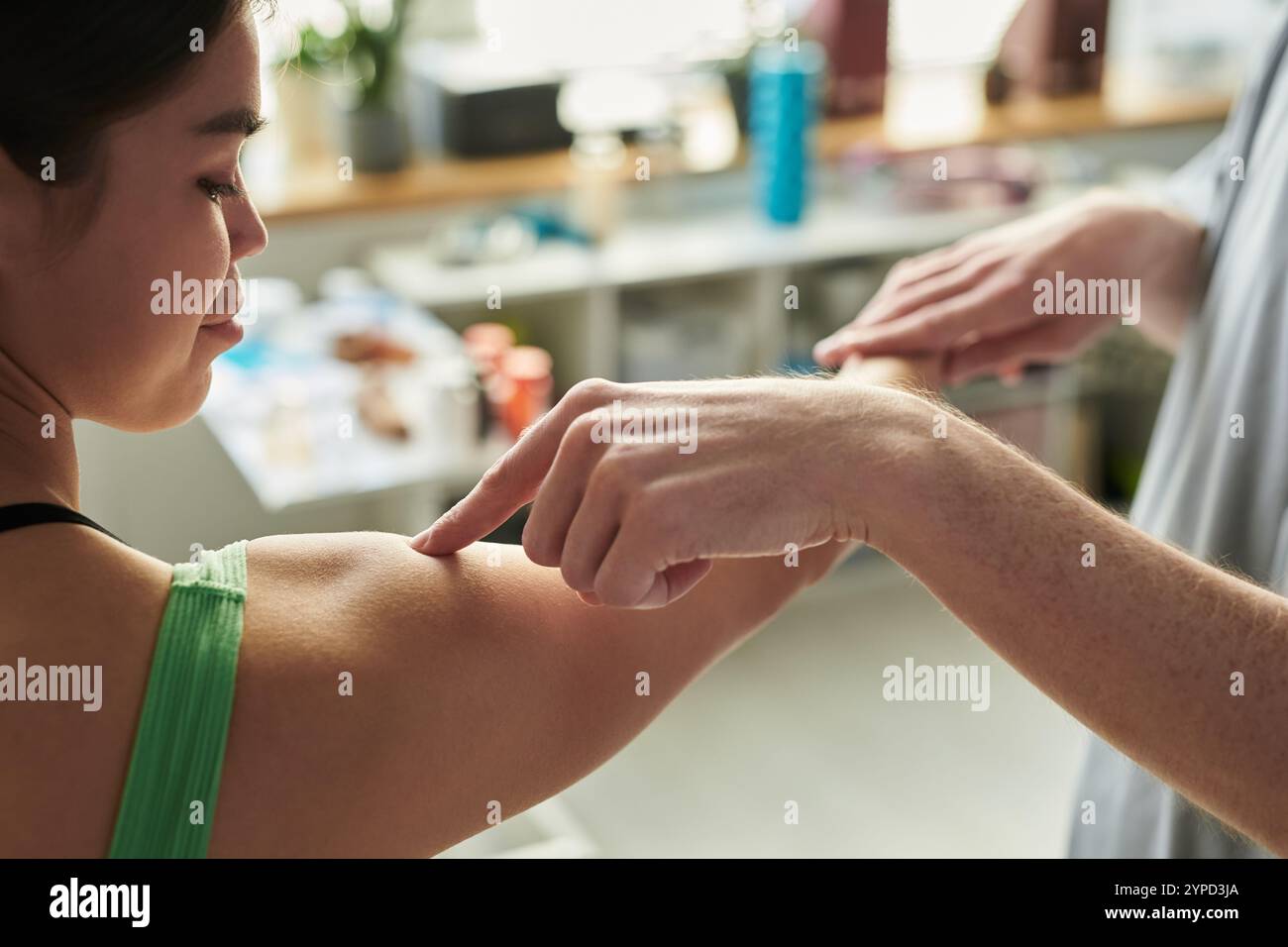 Medical professional administering vaccine injection on woman's arm for ...