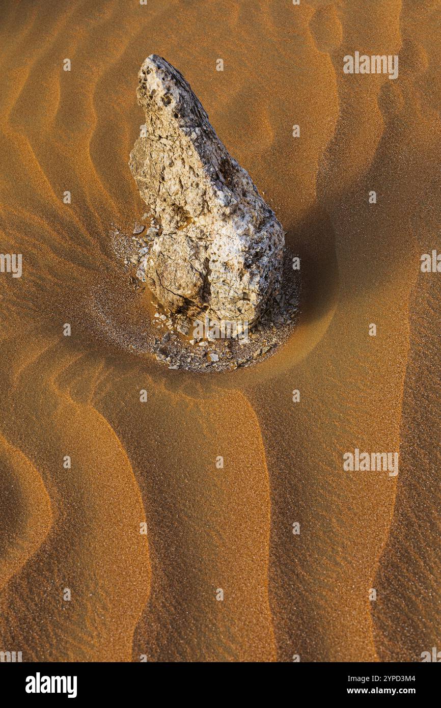 Boulders surrounded by wind-blown sand structures, Huqf stone desert ...