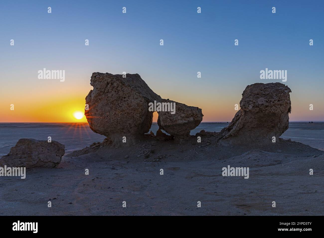 Striking rock formation in the Huqf stone desert at sunrise, Arabian ...
