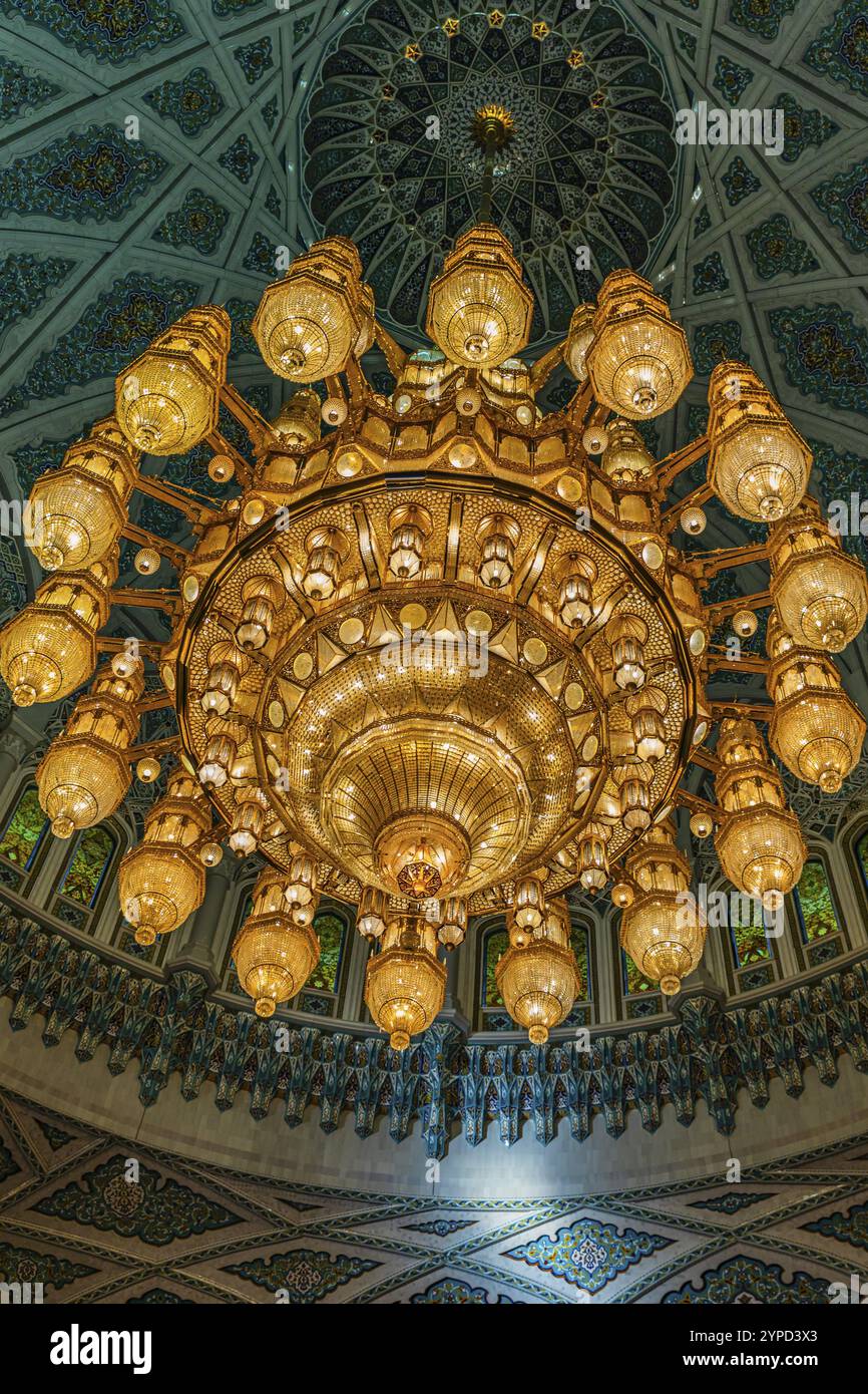 Dome and illuminated chandelier in the Sultan Qaboos Mosque, Muscat ...