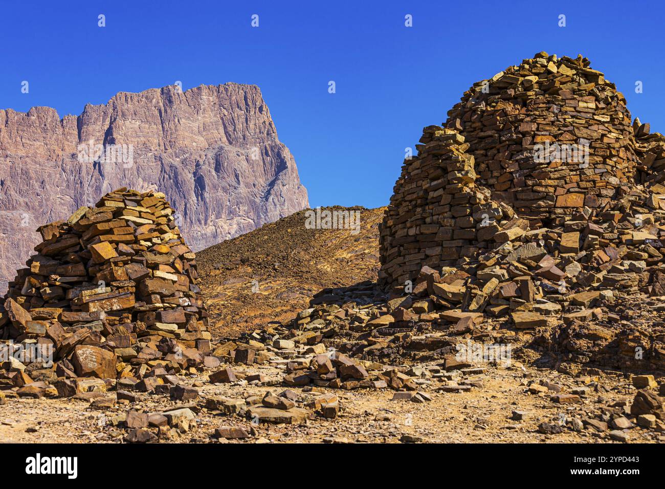Round tombs made of unhewn stones, beehive tombs, behind the summit of ...
