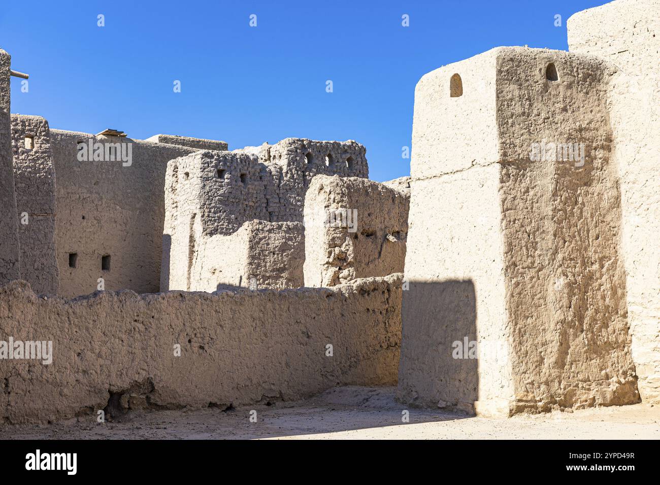 Remains of walls in the largest preserved mud town in Oman, Al Bilaad ...