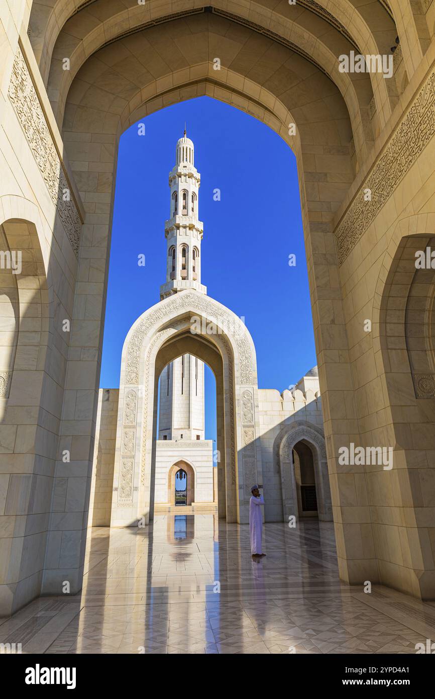 Arched gates and minaret of the Sultan Qaboos Mosque, Muscat, Arabian ...
