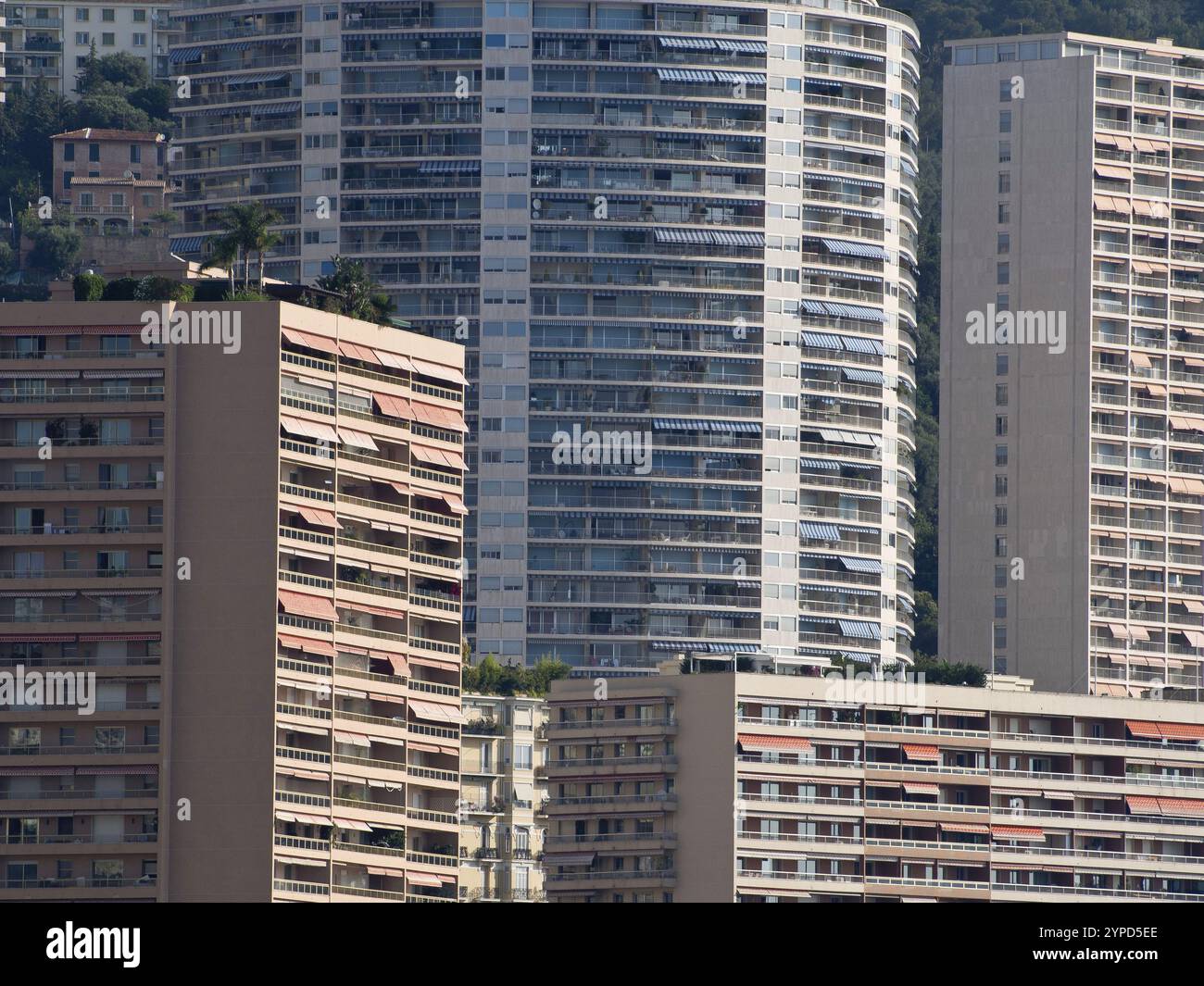 Modern high-rise buildings with glass facades and concrete in a densely ...