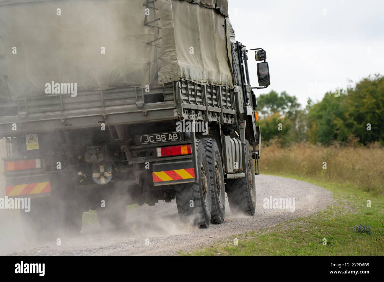 British Army MAN SV 4x4 HX logistics truck driving away from camera on ...