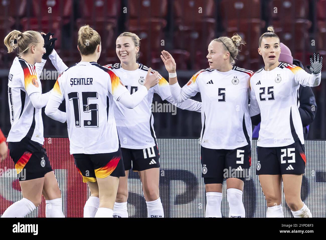 Germany's Laura Freigang, third left, celebrates after scoring during a ...