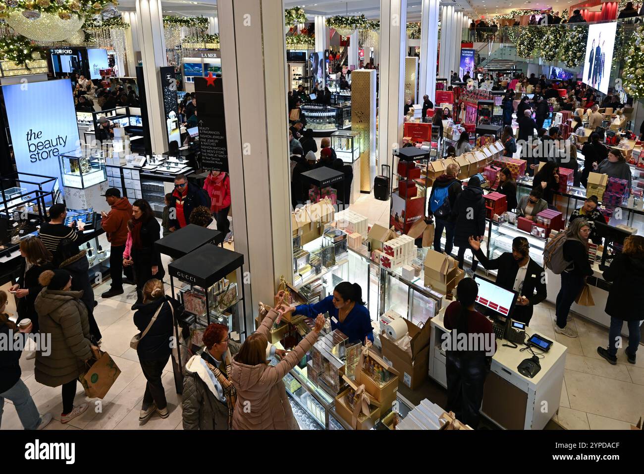 People shop at the Macy's Herald Square flagship store on Black Friday ...