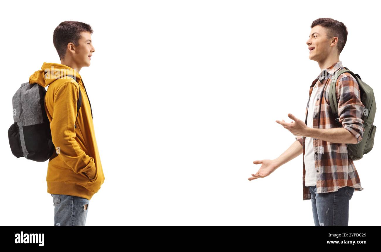 Male teenage students having a conversation isolated on white ...