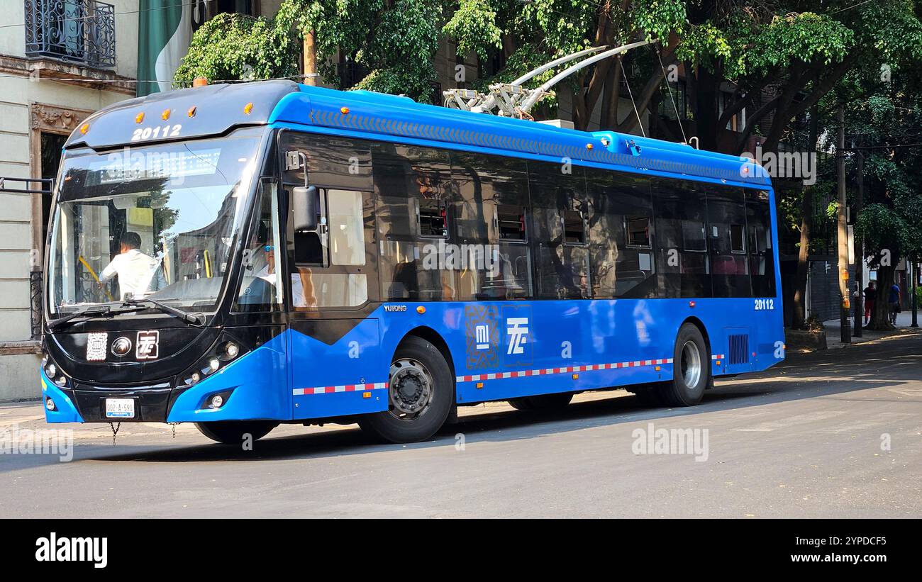 Mexico City, Mexico - May 9 2024: The CDMX Trolleybus is an electric bus powered by cables from ...