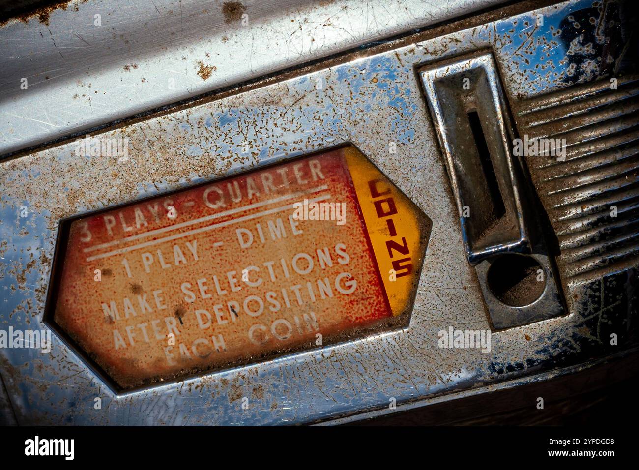 Vintage jukebox coin input close up Stock Photo - Alamy