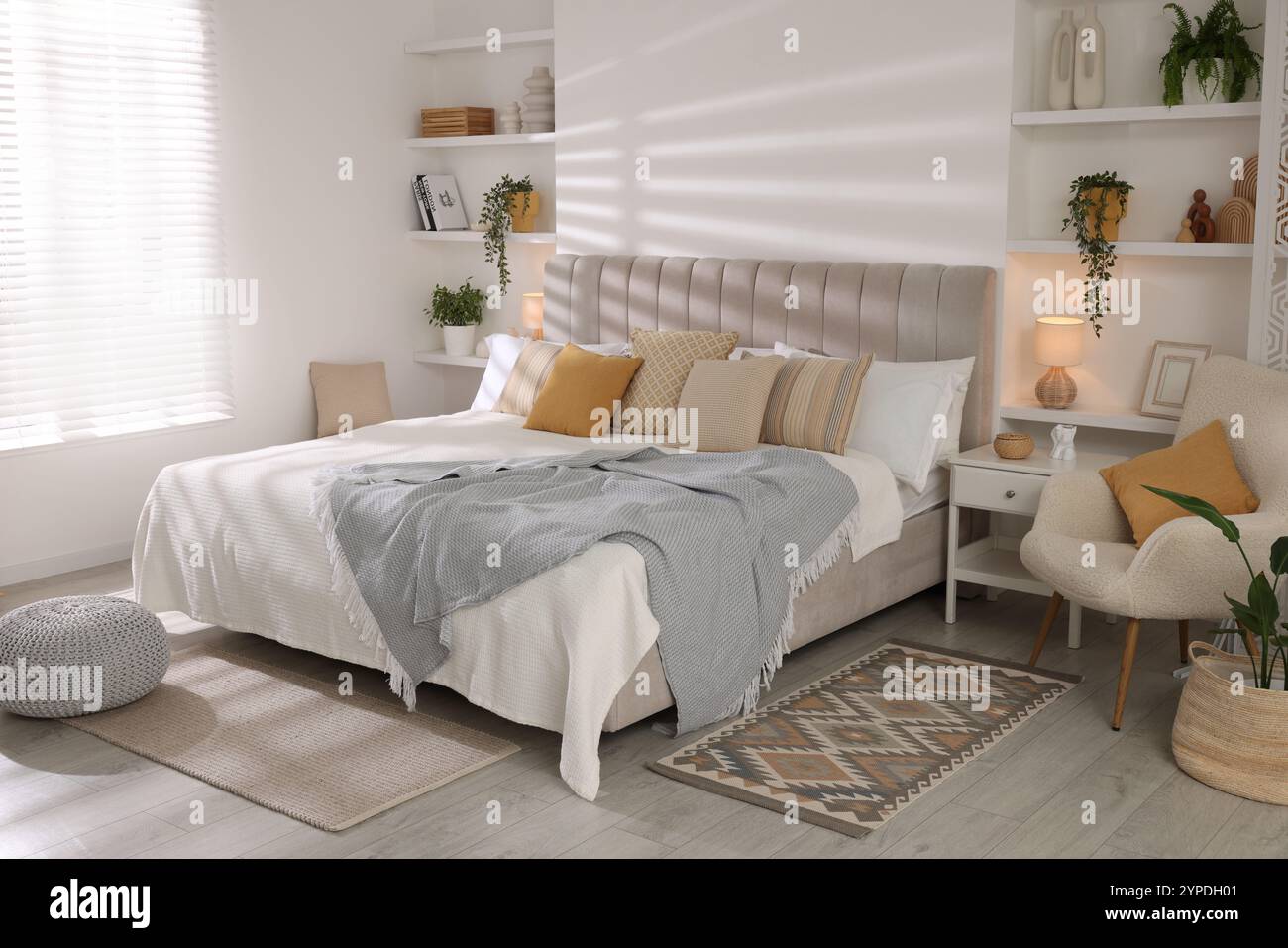 Comfortable large bed in beautiful room. Interior design Stock Photo ...