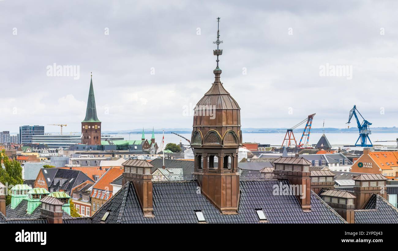 Skyline of Aarhus, Denmark, with the copper-topped towers and spire of ...