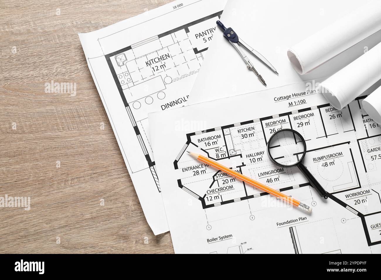 Construction drawings magnifying glass hi-res stock photography and ...