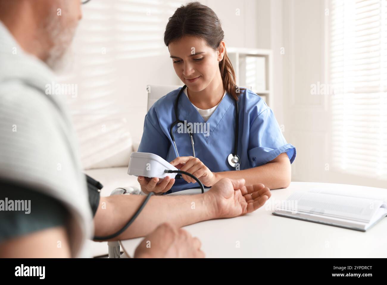 Male doctor measuring heart blood hi-res stock photography and images ...