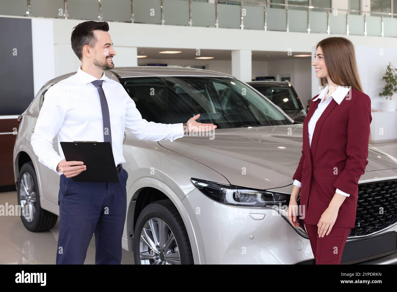 Salesman female customer in car hi-res stock photography and images - Alamy