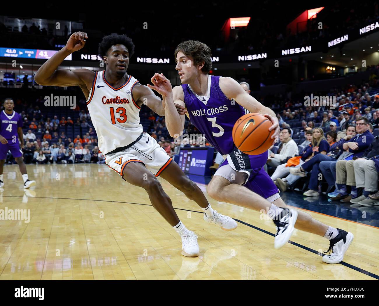 Charlottesville, VA, USA. 29th Nov, 2024. Holy Cross Crusaders Guard (3 ...