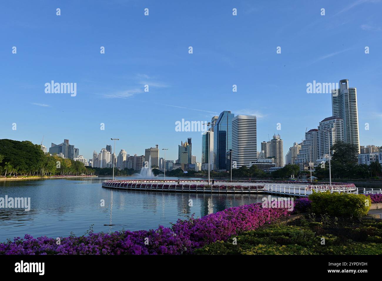 Lake Ratchada and helipad at Benjakitti Park, with commercial and ...